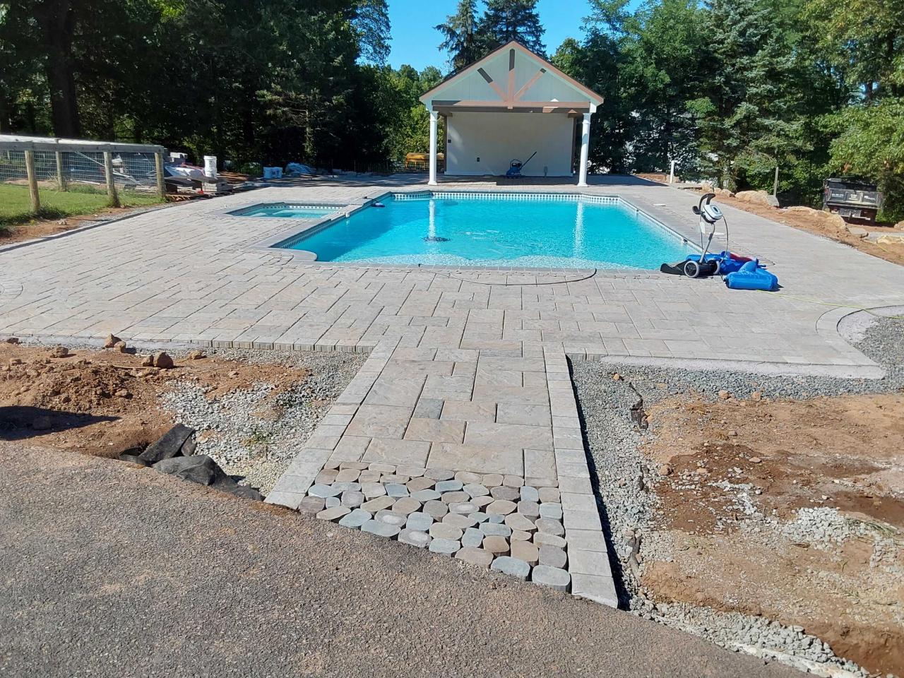 8 Great Reasons for Using Pavers to Surround Your Pool | Whitehouse ...