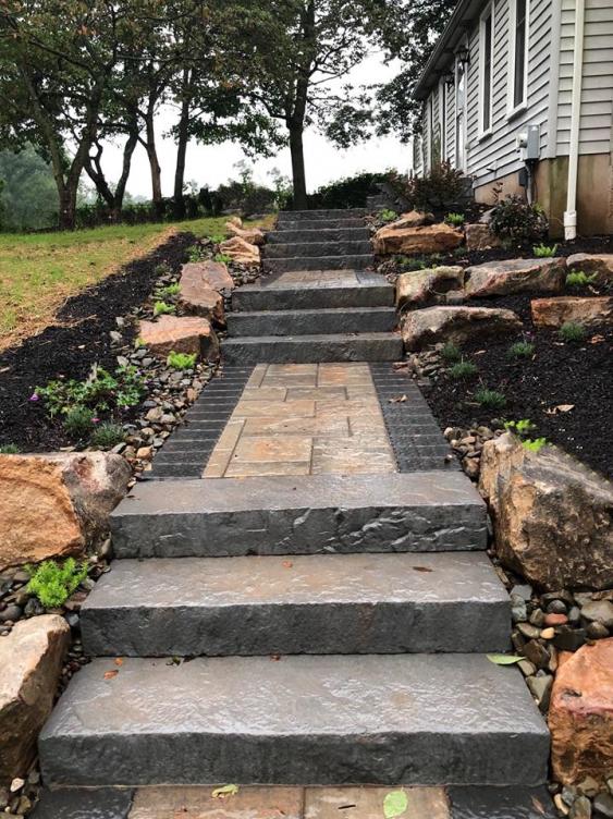 How to Landscape a Sloped Yard for Your Pottstown, Douglassville or ...